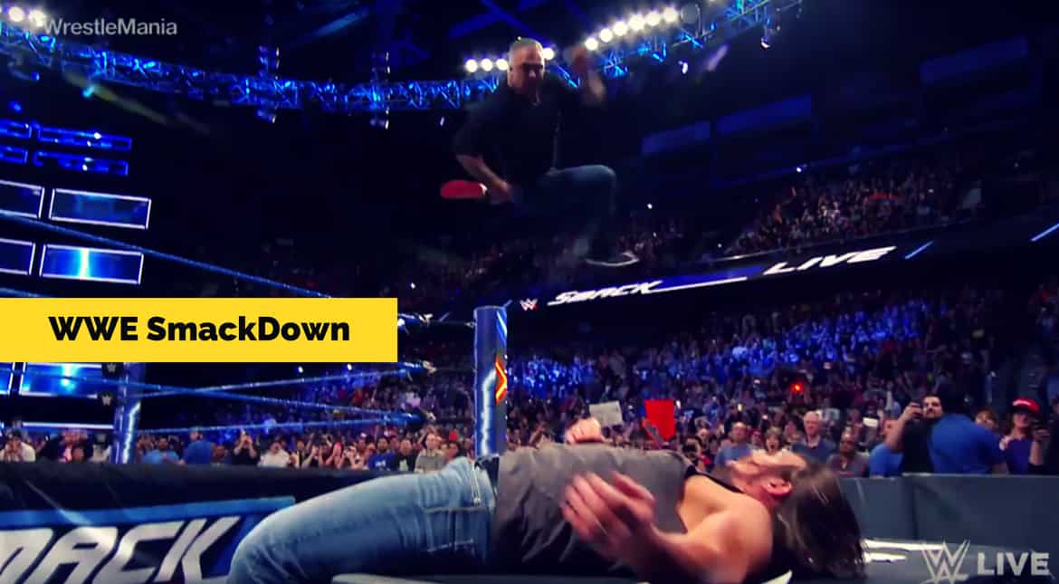 Shane Mcmahon Hits Aj Styles With An Elbow Onto The Announce Table