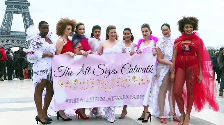 Plus-size models strike a pose in front of the Eiffel Tower - World News