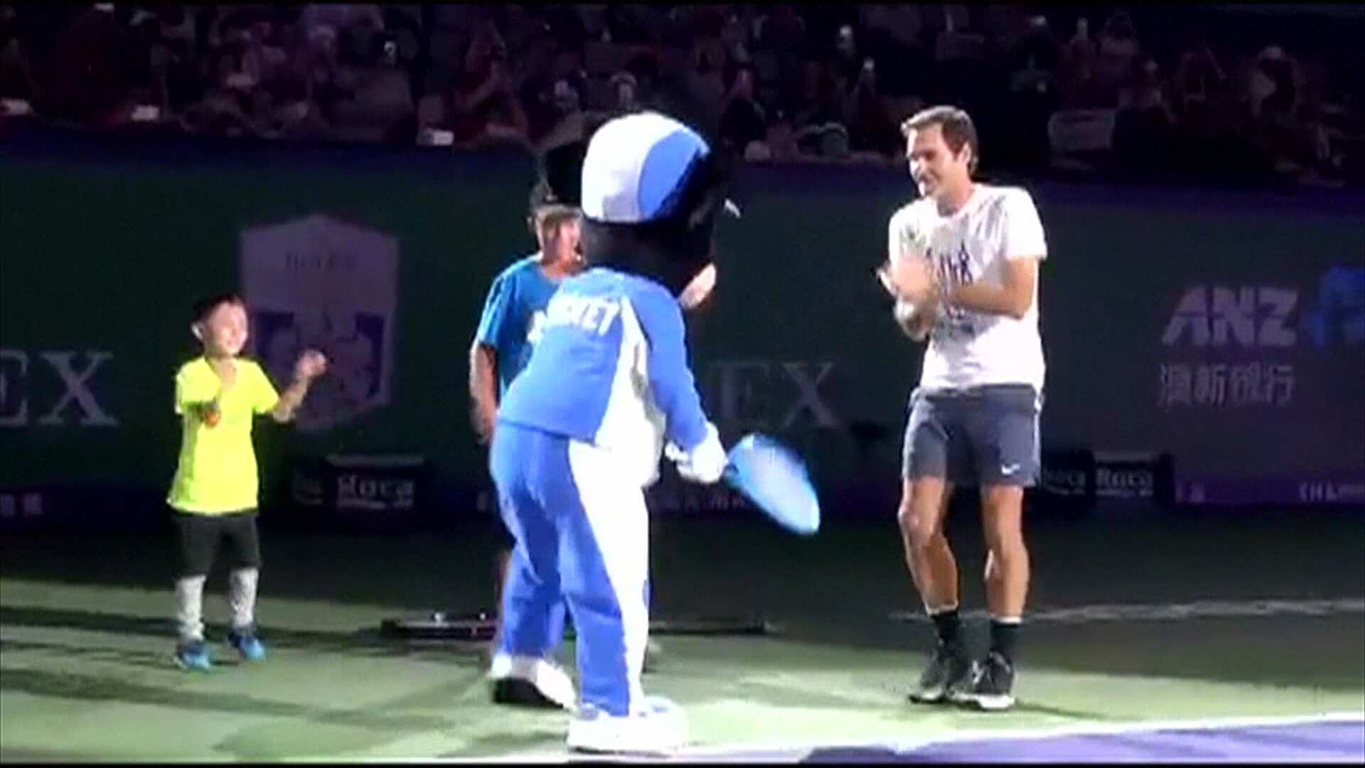 Roger Federer dances with Mickey Mouse - Sports News