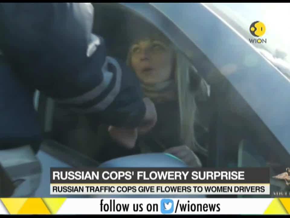 Traffic cops give away flowery surprise to women drivers - World News