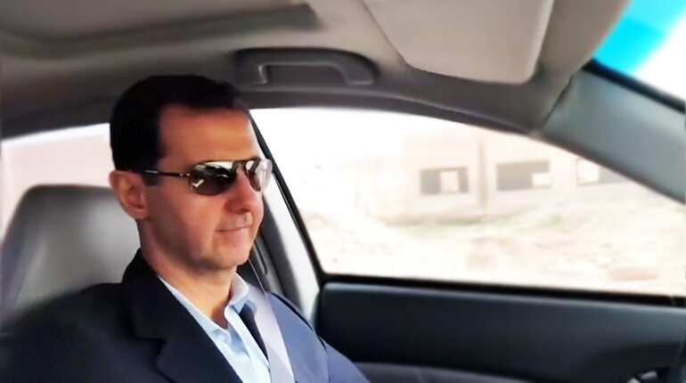 In the front seat with Assad as he tours eastern Ghouta - World News