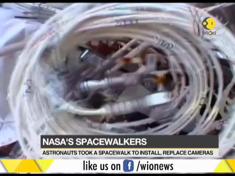 Astronauts take a walk in space to install replace cameras - World News