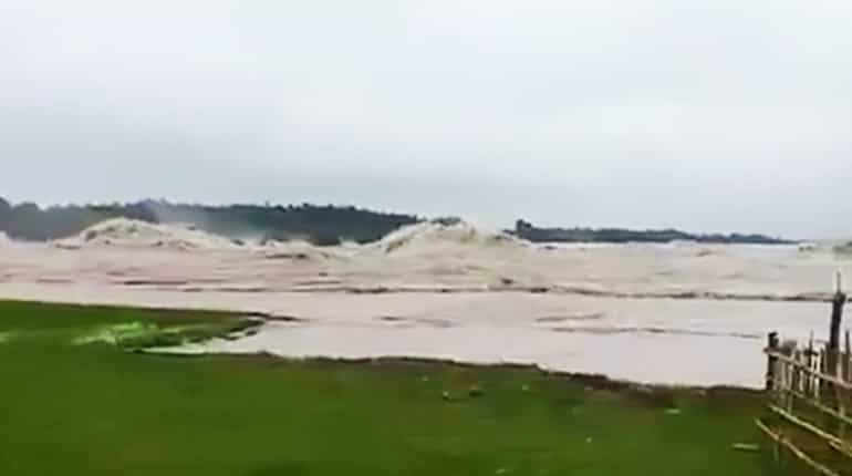 Video: Rescuers struggle to reach stranded in Myanmar dam flooding ...