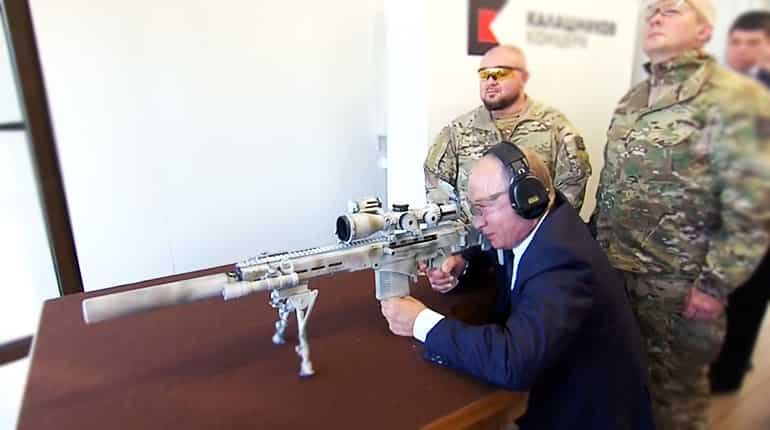 Watch: Putin shows off sniper skills firing Kalashnikov rifle - World News