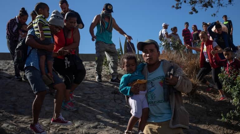 Migrant parents separated from children return to US, plead to be ...