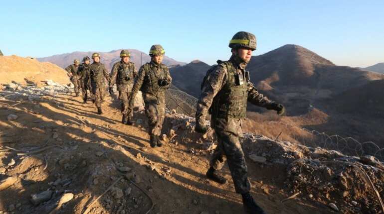 In Pics: In a first, Korean soldiers cross border peacefully - World News