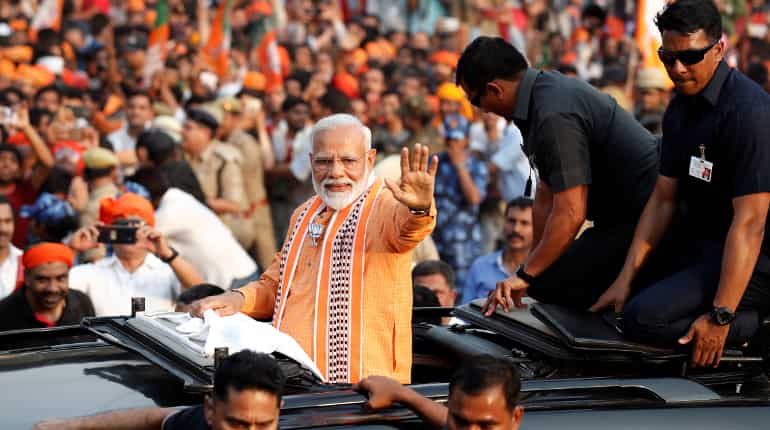 'Modi wave' sweeps Varanasi as huge crowd gathers at roadshow - India ...