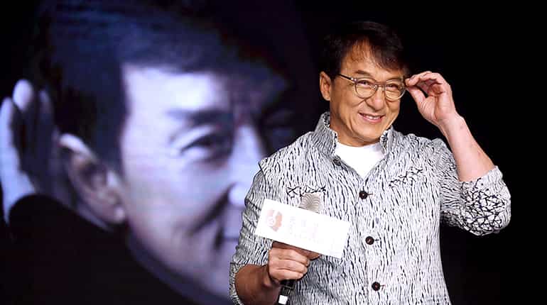 Action star Jackie Chan promotes his new album with live performance in ...