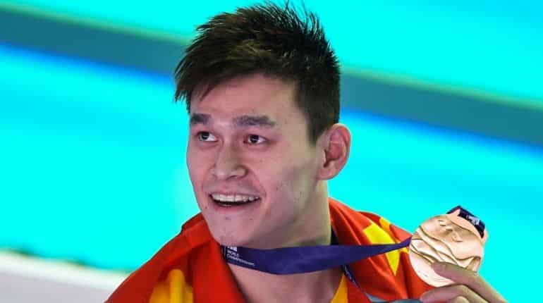 China's Sun Yang blazes to record fourth 400m freestyle world crown ...