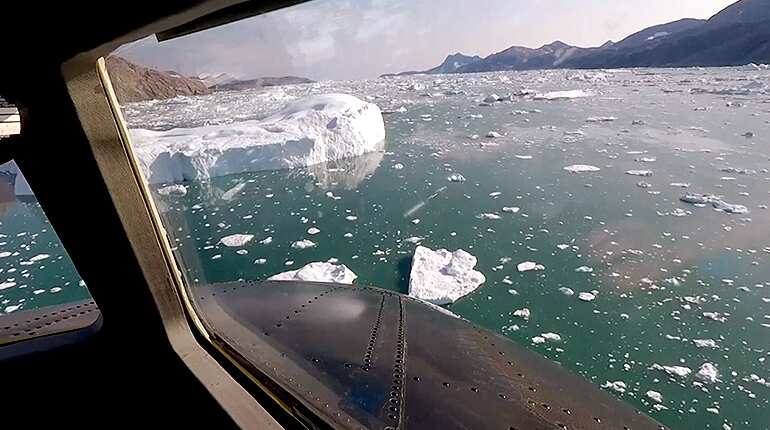Scientists fly over Greenland to track melting ice - World News
