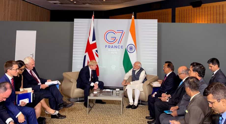 PM Modi meets British counterpart Boris Johnson on sidelines of G7 Summit in France - India News ...