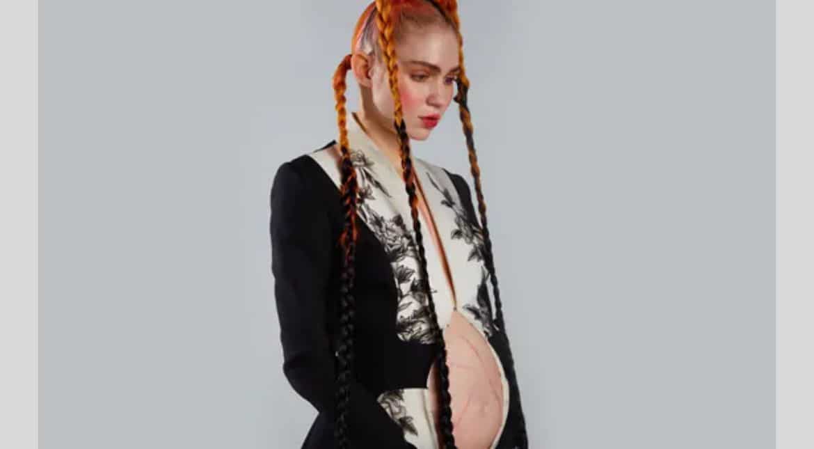 Singer Grimes reveals she's pregnant with Elon Musk's child ...