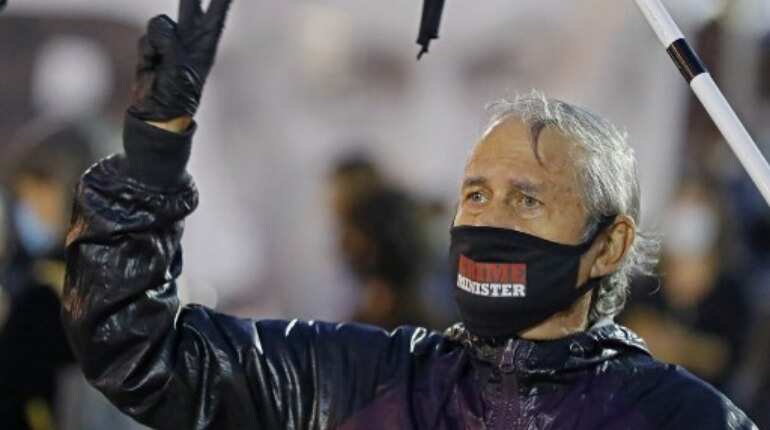 With face masks, thousands protest in Israel against Netanyahu-Gantz ...