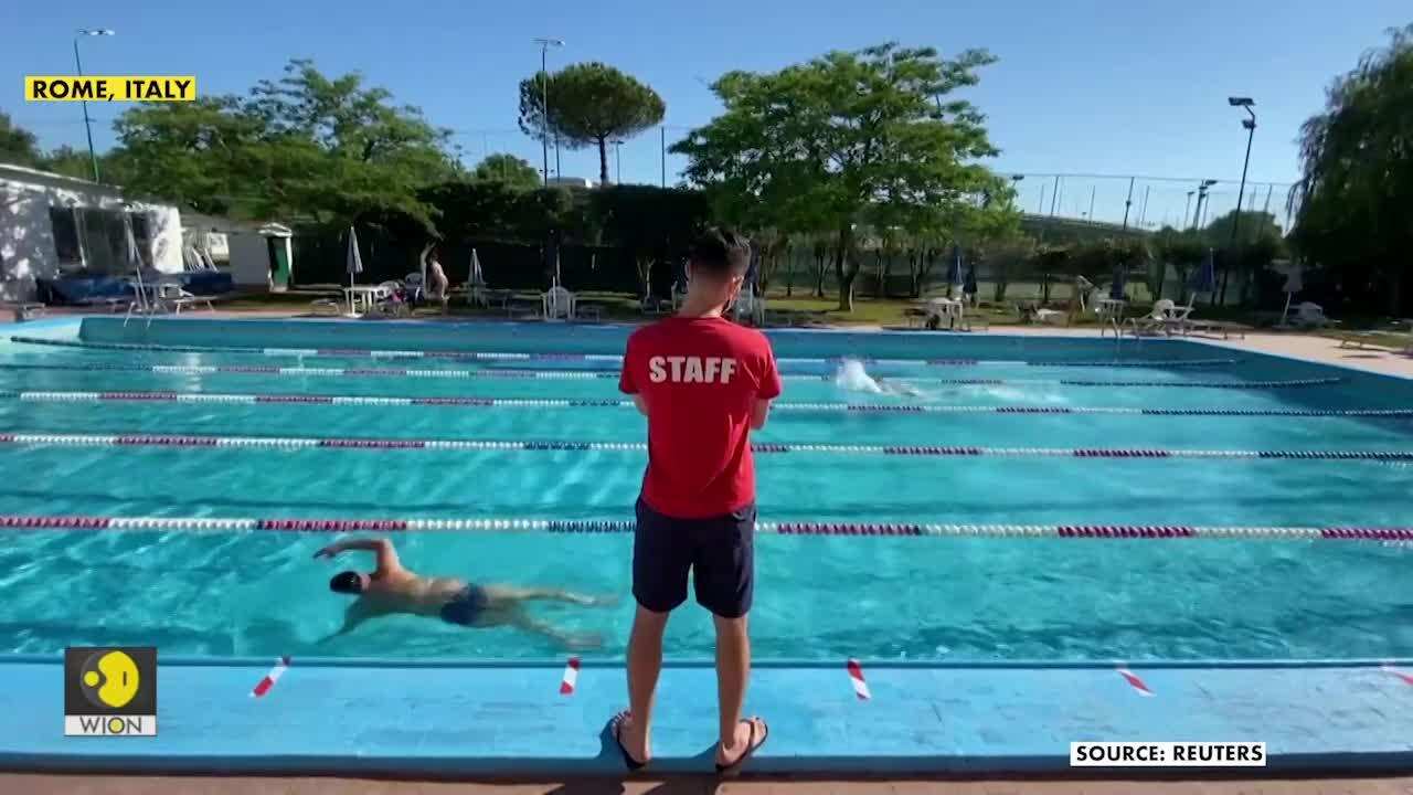 Swimming social-distance style as pools reopen in Italy - Edge News