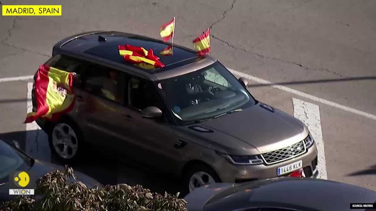 Waving Spanish flags, Madrid residents protest against lockdown - Edge News