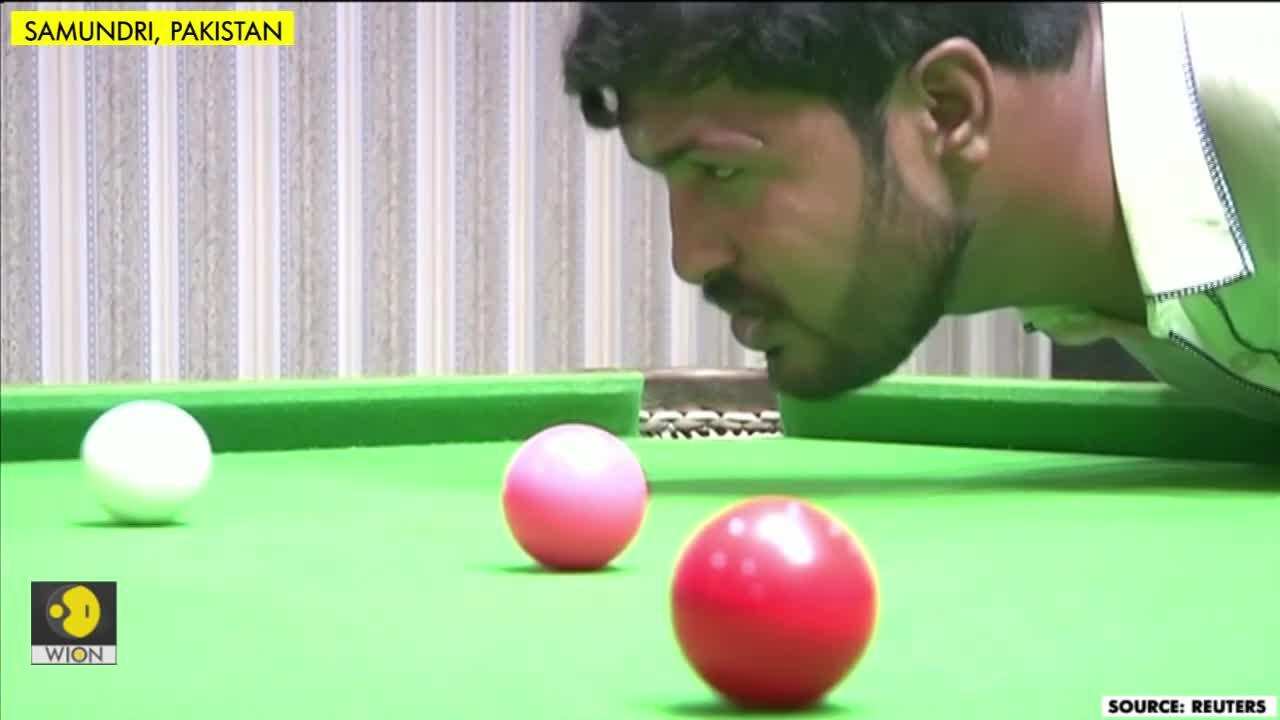 Armless Pakistani snooker player masters game with only his mouth ...