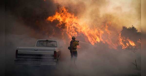 Southern California wildfires prompt mass evacuations, two firefighters injured - World News