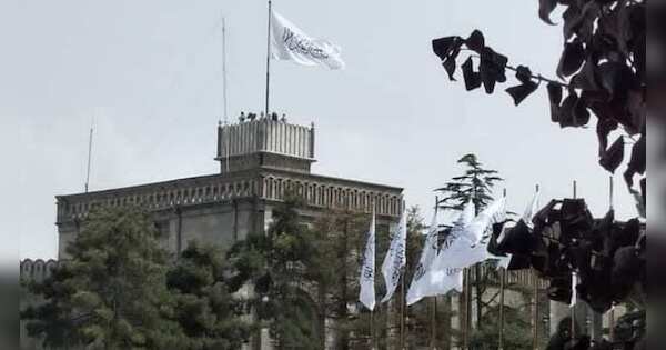 Taliban raise flag on Afghan presidential palace as US marks 9/11 ...