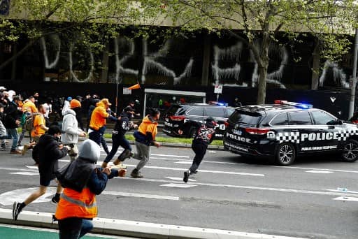 Melbourne anti-Covid vaccine protests turn violent as police fire ...