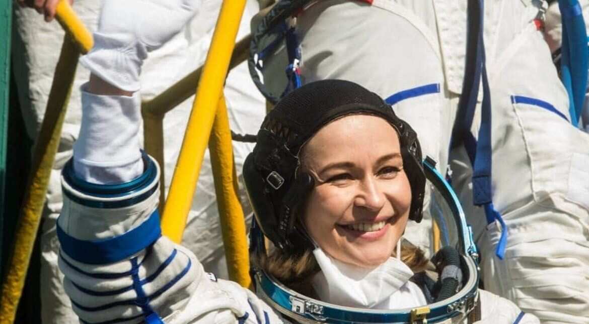 Russian crew arrives at space station to film first movie in orbit ...