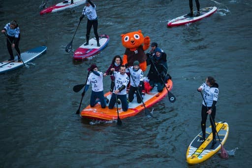 In Pics | Nearly 1,000 people participate in world’s biggest stand-up ...