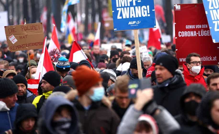Nearly 44,000 people protest in Austria after government mandates Covid ...