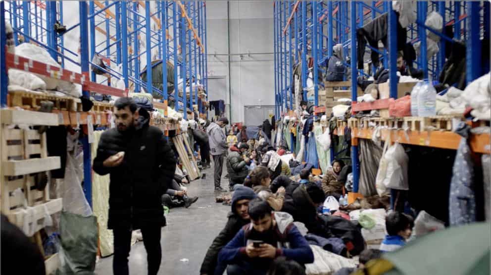 Hundreds of middle eastern migrants found in a Belarusian warehouse in ...