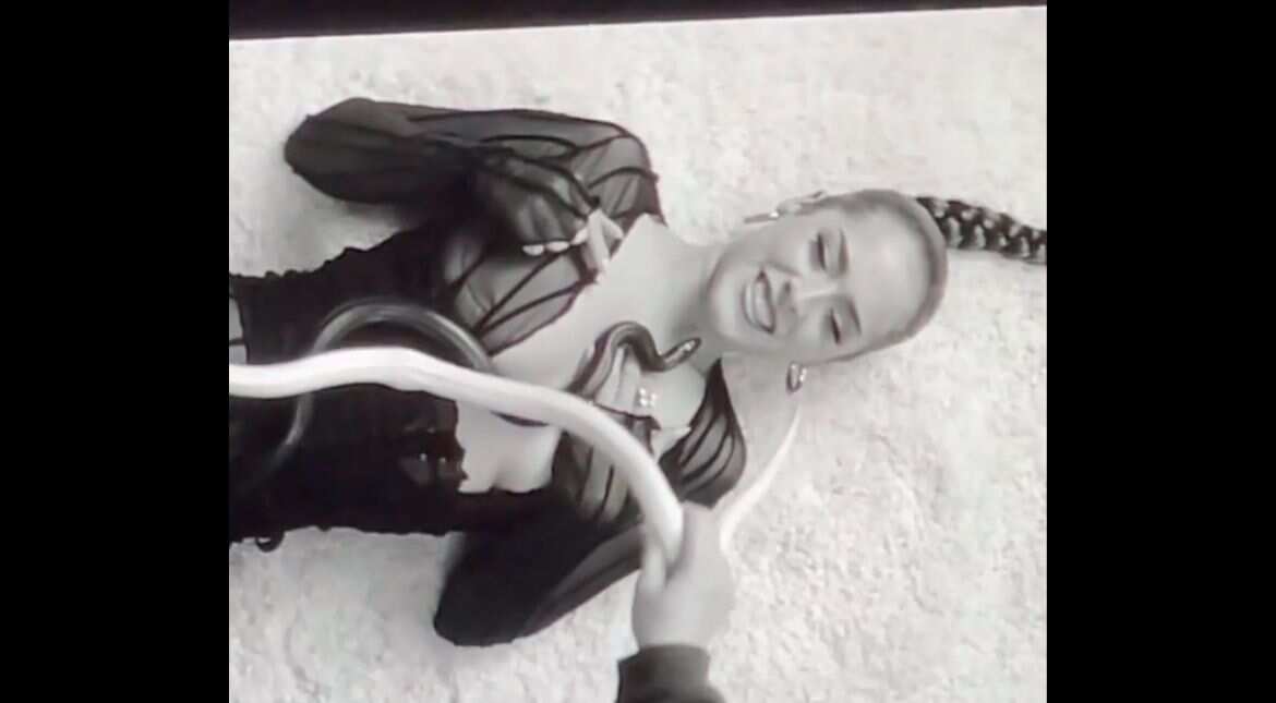 Watch viral video: Singer gets bitten by snake while shooting for music ...