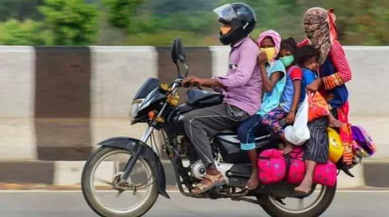 India makes helmets and safety harnesses a must for kids riding pillion ...