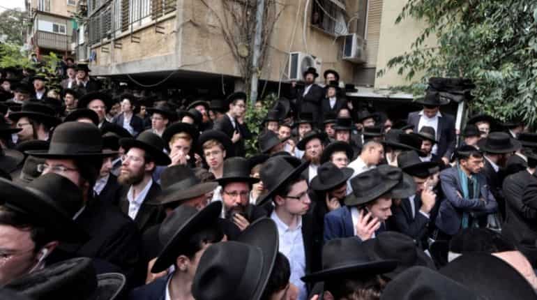 Revered Jewish sage buried in one of the largest gatherings in Israel's ...