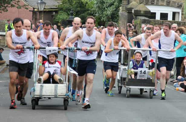 Bed race in England after two-year-hiatus: Money raised in the race ...