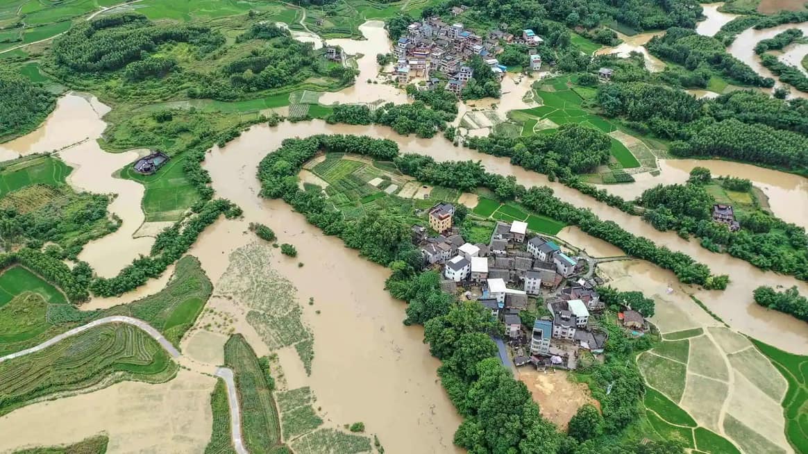 In pics - Floods and landslides as heaviest rain in 60 years hits ...