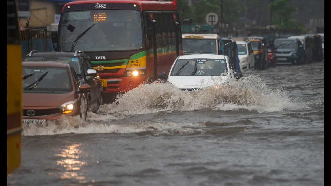 Heavy rainfall hits India's Mumbai | Train services disrupted in ...