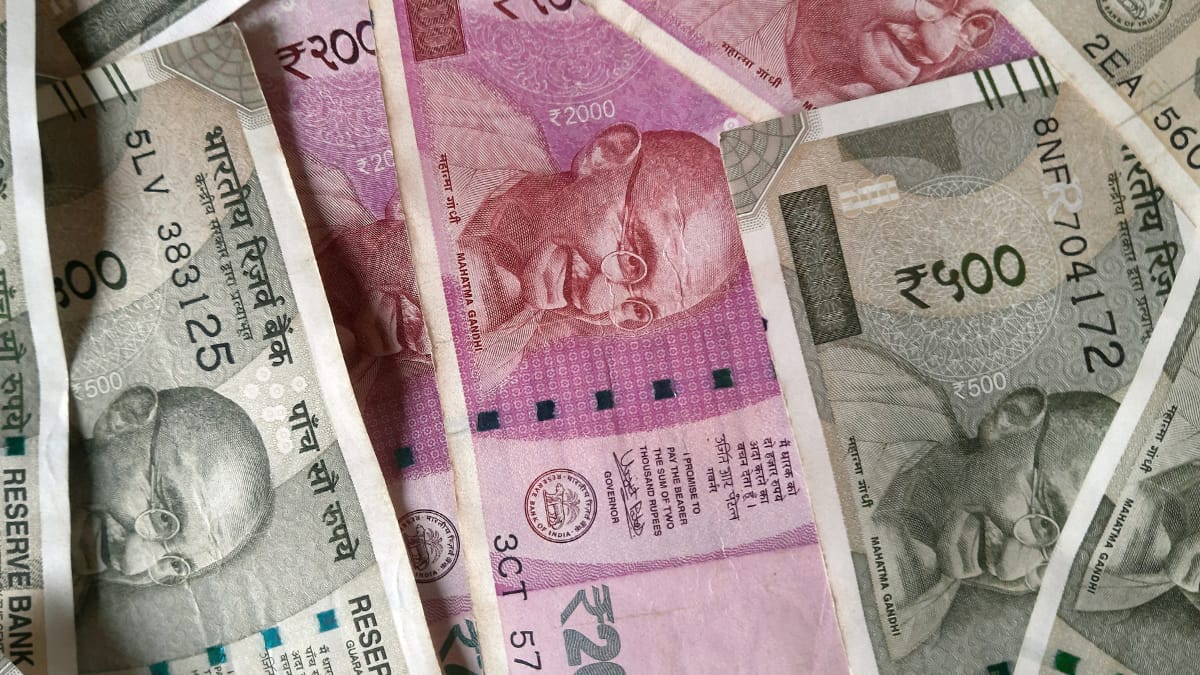 Indian rupee hits low of 80 per dollar for the first time ever - India ...