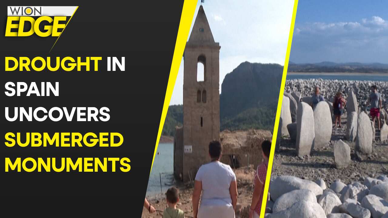 Tourists flock as severe drought in Spain uncovers submerged monuments ...