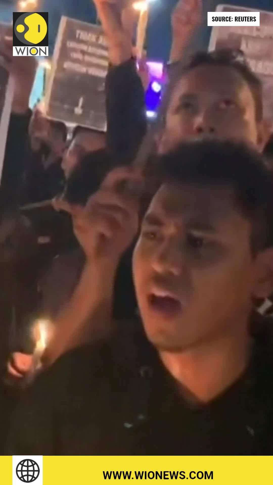 Hundreds attend a candlelight vigil for Indonesia's football riot ...