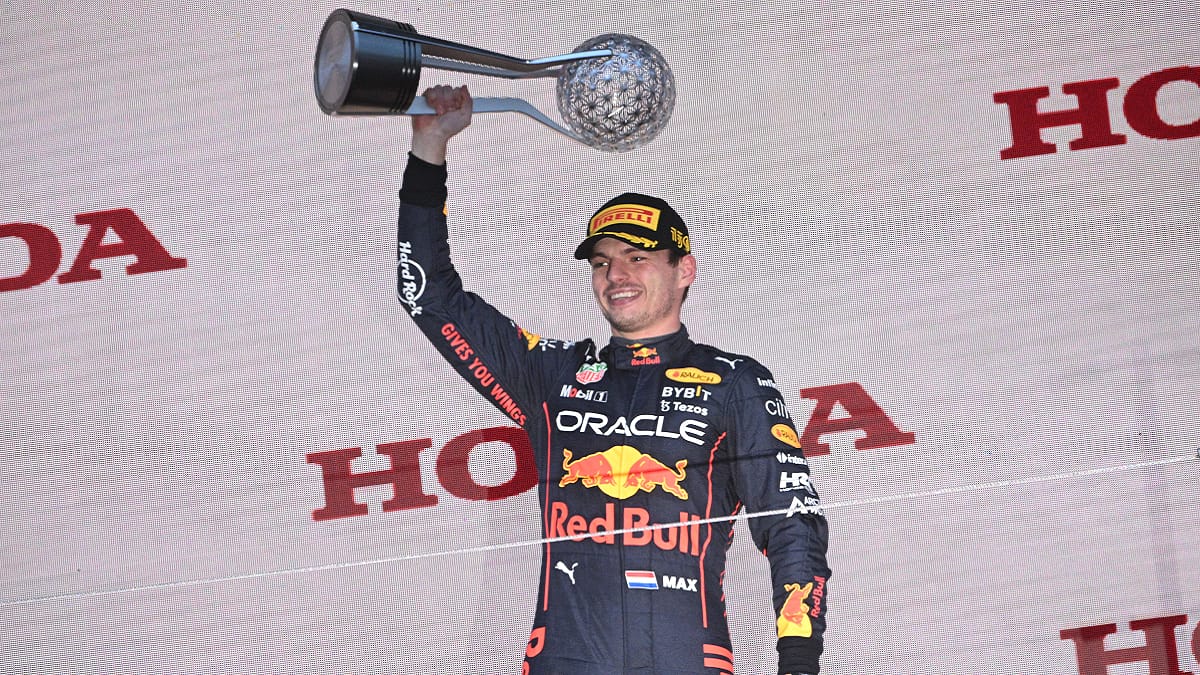 Red Bull's Max Verstappen retains Formula One world title after dramatic win at Japan Grand Prix ...