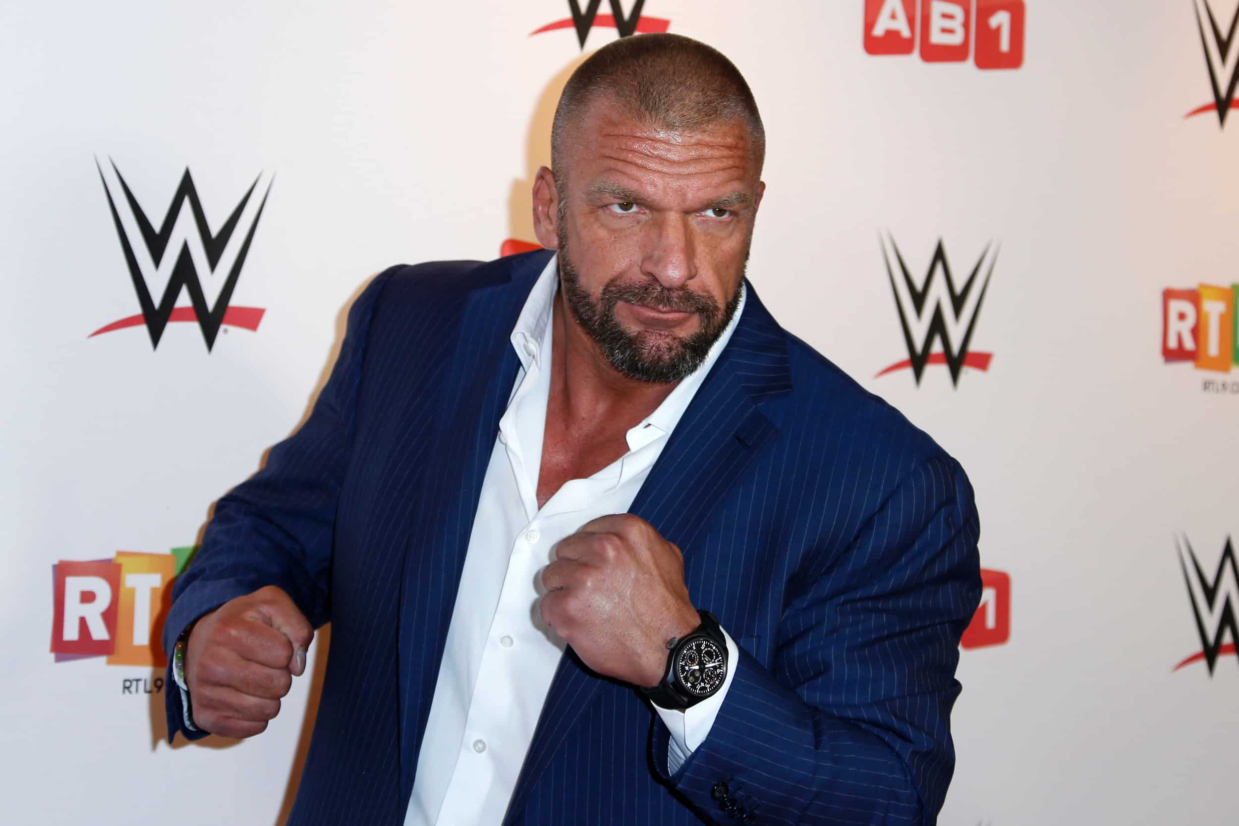 WWE 2022: Triple H officially retires 24/7 Championship after Nikki ...