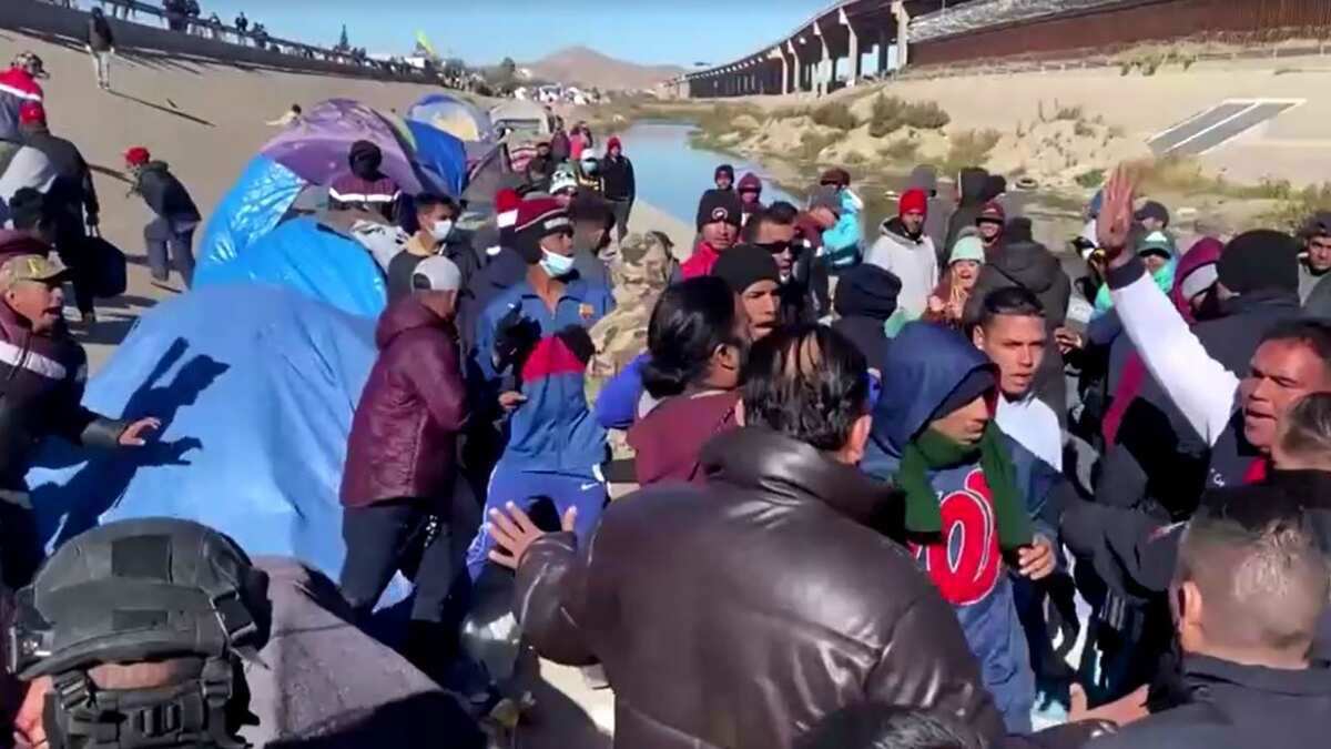 Scuffle between police and migrants near US-Mexico border, camps ...