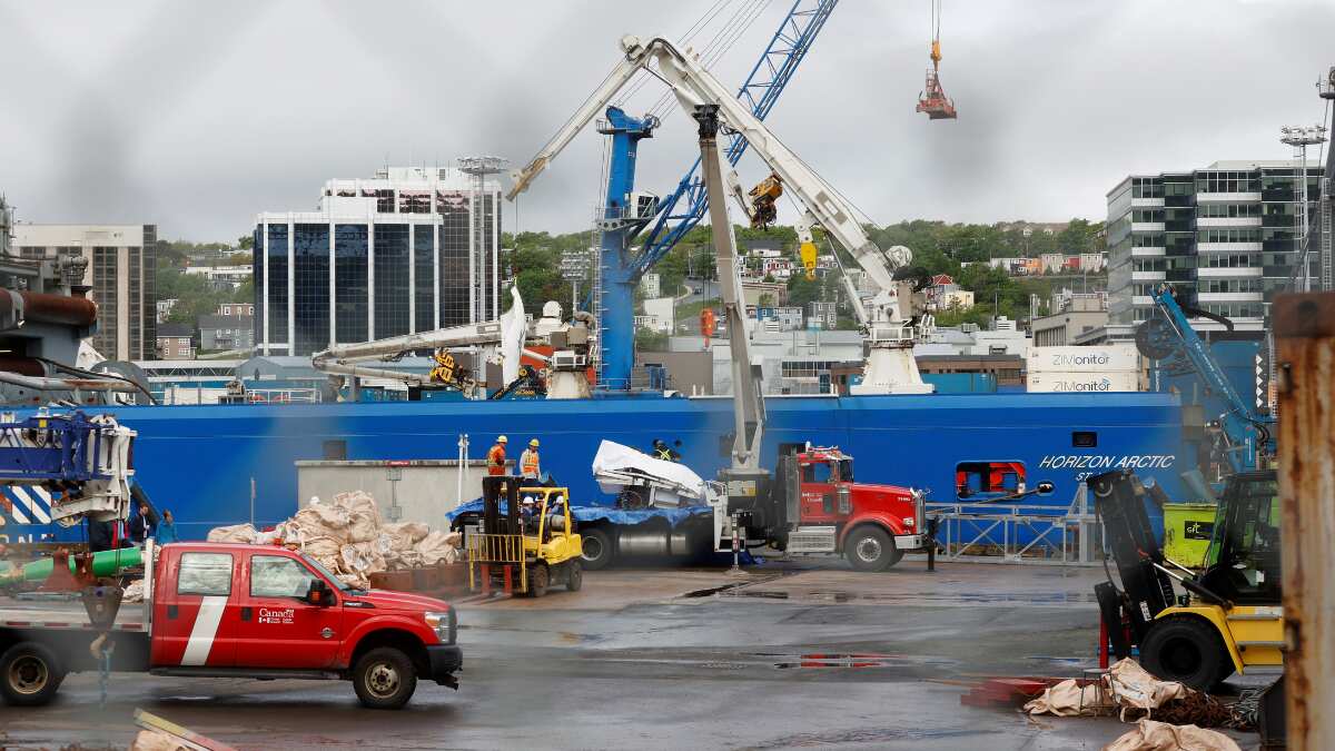Pieces of Titan submersible brought to shore - World News