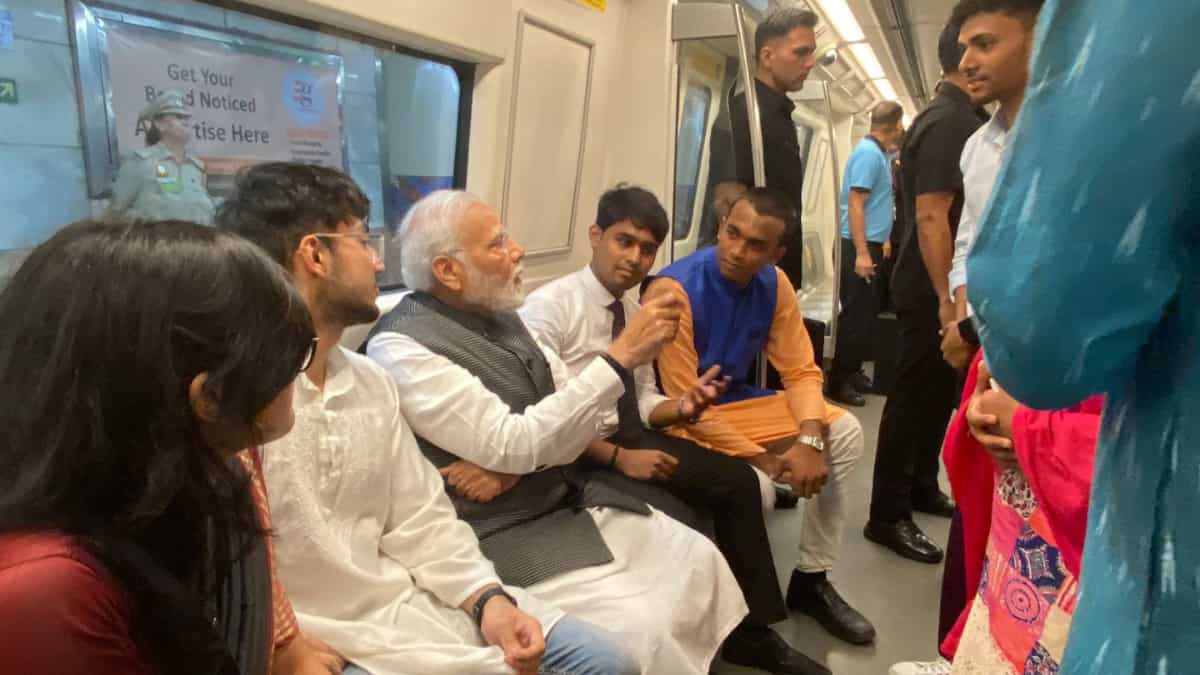 Prime Minister Modi takes the metro to Delhi University event - India ...