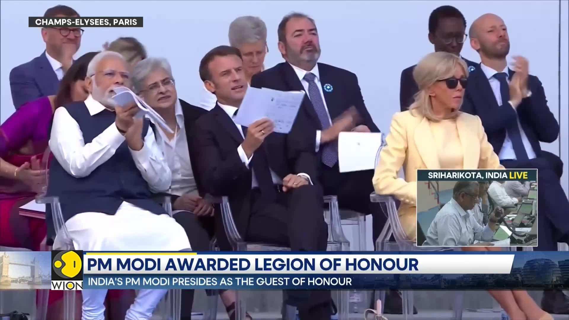 Indian PM Modi attends Bastille Day parade in Paris with French ...