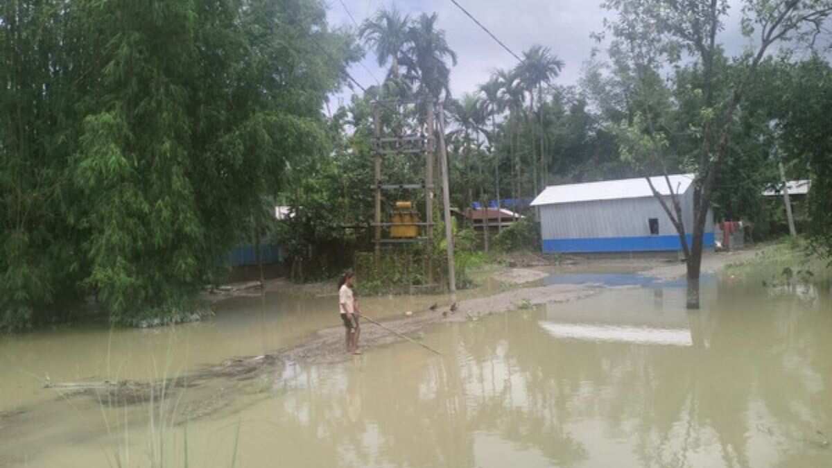 Intense rains cause floods in Assam, IMD issues red alert for north ...