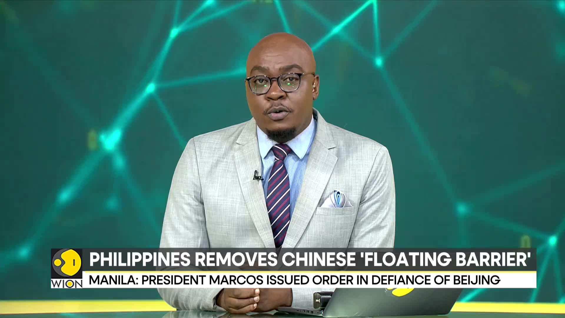 Philippines removes Chinese 'floating barrier' in contested Shoal area ...