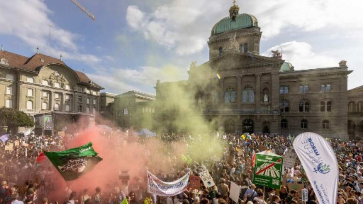 In pics | More than 60,000 people demand climate action in Swiss ...