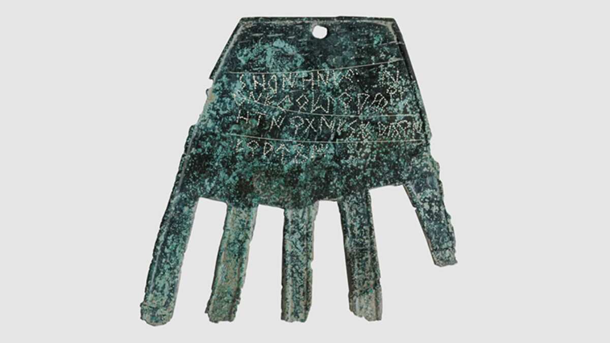 Ancient mystery! 2,000-year-old bronze hand reveals enigmatic script ...