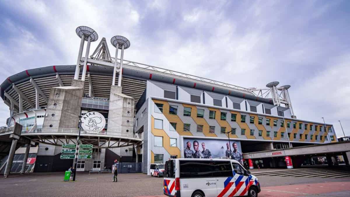 Ajax fans riot in Amsterdam after matches get postponed due to police ...