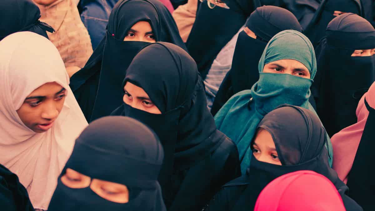 Iran delays hijab law, president calls it 'ambiguous and in need of ...