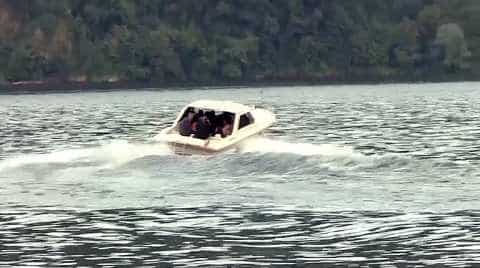 George Clooney and Barack Obama leave Clooney home on Lake Como by boat ...