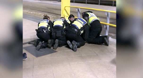 Police restrain man News - Latest Police restrain man News, Breaking ...